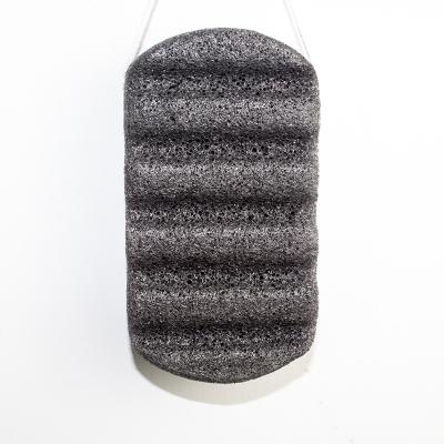 China 11.5*6.2*2.8cm Wavy Charcoal Bath Sponge Exfoliating Konjac Facial Cleanser for sale