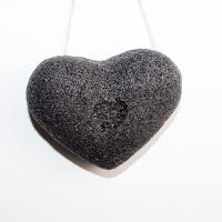China OEM ODM Bamboo Charcoal Konjac Sponge Soft Bathing Scrubbing Sponge for sale