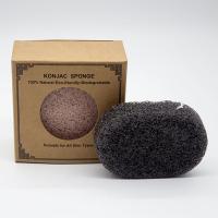 China Large Light Orange Oval Cosmetic Sponge Baby Bamboo Charcoal Konjac Facial Sponge for sale