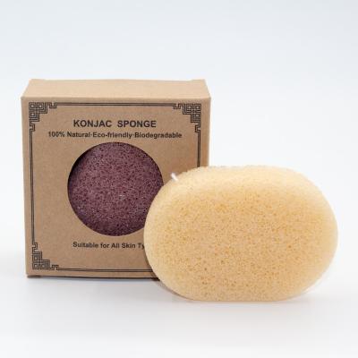 China Large Light Orange Oval Cosmetic Sponge Baby Bamboo Charcoal Konjac Facial Sponge for sale