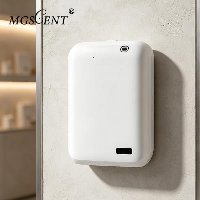 China 3W Two Fluid Atomization Aroma Diffuser Machine Wall-Mounted Eco Friendly PP Home Fragrance Device for sale
