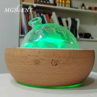 China Bluetooth Music 7-Color RGB Light Glass Spout Ultrasonic Aroma Diffuser Smart Scent Machine for sale