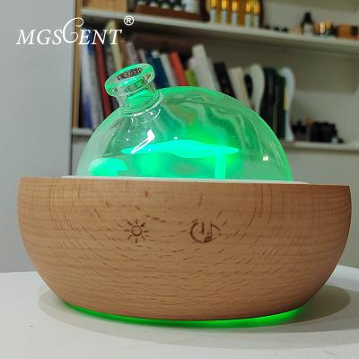 China Bluetooth Music 7-Color RGB Light Glass Spout Ultrasonic Aroma Diffuser Smart Scent Machine for sale