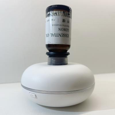 China Wireless Aromatherapy Diffuser with Seven-Color Ambient Light Built-in Lithium Battery and Intelligent Sensing for sale