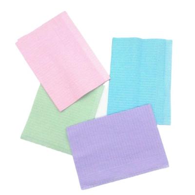 China Disposable waterproof dental bib customizable medical sterile absorbent dental bib for sale