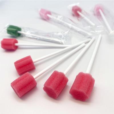 China Colorful Dental cleaning Sponge Individually Wraped Dentrifice Flavored Oral Swab Stick with Paper Stick for sale