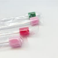 China Colorful Dental cleaning Sponge Individually Wraped Dentrifice Flavored Oral Swab Stick with Paper Stick for sale