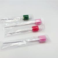 China Colorful Dental cleaning Sponge Individually Wraped Dentrifice Flavored Oral Swab Stick with Paper Stick for sale