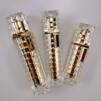 China Pull-Ring Sealing Type Golden Yellow Acrylic Bottles with Press Pump 30ml 50ml 100ml for sale