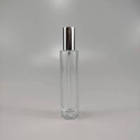 China ODM OEM Printing 35ml Round Glass Perfume Bottle with Golden Silver Pump Sprayer for sale