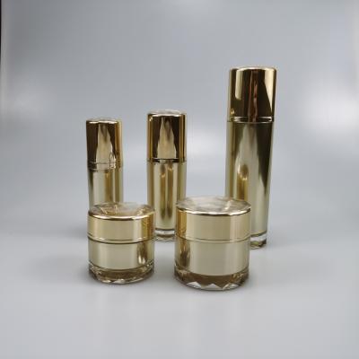 China Plastic Type Acrylic ODM OEM Acceptable Cylinder Gold Cream Jar for Eye Cream for sale