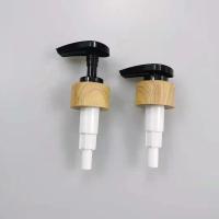 China Non-Refillable Shampoo Bottle Lotion Pump 24/410 28/410 with Bamboo Printing Lid for sale