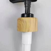 China Non-Refillable Shampoo Bottle Lotion Pump 24/410 28/410 with Bamboo Printing Lid for sale