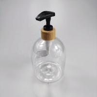 China Non-Refillable Shampoo Bottle Lotion Pump 24/410 28/410 with Bamboo Printing Lid for sale