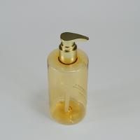 China PP Material Plastic Bottle Pump Lotion Dispenser with UV Coating and Matt Gold Collar for sale
