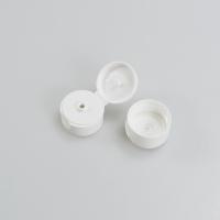 China PP Plastic 32mm White Flip Top Cap for Cosmetic Packaging Screw Cap Plastic Lids for sale