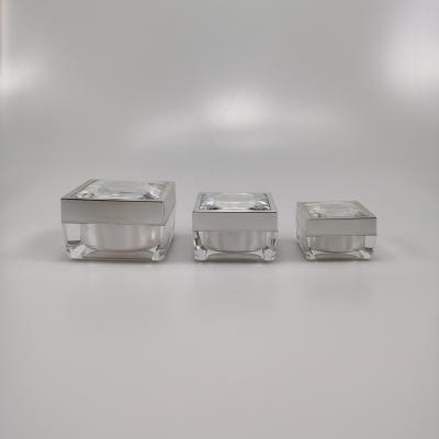 China Skin Care Cream Plastic Cap 15g 30g 50g Square Acrylic Eye Cream Jar with Diamond Silver Lid for sale