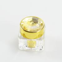 China Reusable Cosmetic Packaging Container 10g Gold Eye Cream Acrylic Plastic Jar Material for sale