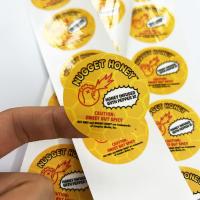 China OEM Custom Offset Printing Stickers Gold Foil Round Sticker Roll for sale