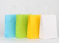 China Custom Logo Paper Kraft Shopping Bag Embossing With Handle for sale