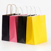 China Glossy Lamination Recycled Kraft Shopping Bags With Handles for sale