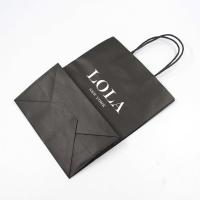 China Black White Printing Kraft Paper Bag Reusable  With Handles for sale