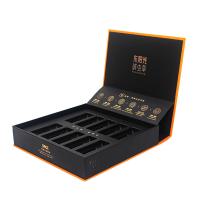 China Custom Printing Gold Foil Orange Black Beauty Makeup Folding Magnetic Gift Box With Tray for sale