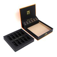 China Custom Printing Gold Foil Orange Black Beauty Makeup Folding Magnetic Gift Box With Tray for sale
