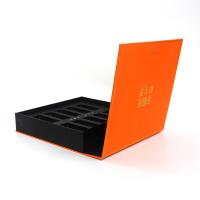 China Custom Printing Gold Foil Orange Black Beauty Makeup Folding Magnetic Gift Box With Tray for sale