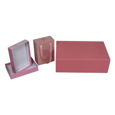 China Custom Design Jewelry Box with Embossed Printing Handling and Corrugated Board Lid for sale