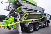 China Open Hydraulic Control Four Arm M-shaped Folding 32-4M Truck-mounted Concrete Pump With Mixer for sale