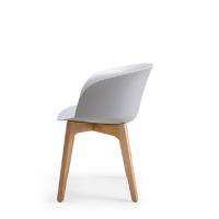 China Ergonomic Restaurant Chair And Table Restaurant Arm Chairs Molded PP Solid Ash Wood Legs for sale