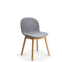 China Fabric Upholstered Restaurant Dining Chairs PP Solid Ash Wood Legs For Hotel for sale
