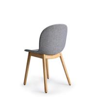 China Fabric Upholstered Restaurant Dining Chairs PP Solid Ash Wood Legs For Hotel for sale