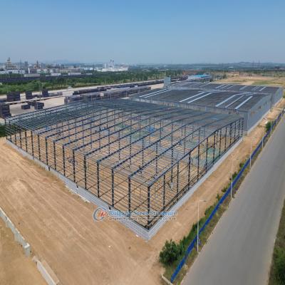 China Custom Steel Structure Warehouse with Sliding Doors - 50+ Year Lifespan for sale