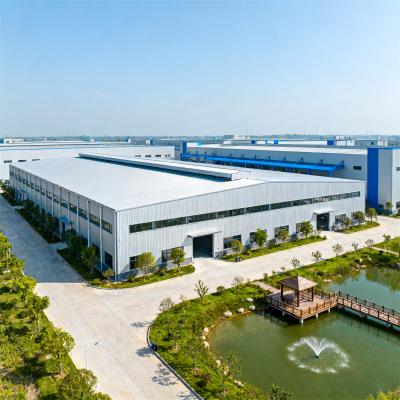 China Durable PEB Steel Structure Pre-Engineered Building with Wind Load Up to 300 km/h Hot-dip Galvanization and Bolted or Welded Connection for sale