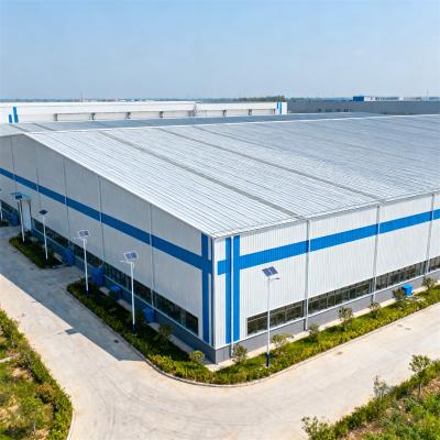 China Prefabricated Industrial Factory Warehouse Metal Frame Pre Engineered Steel Structure Buildings for sale