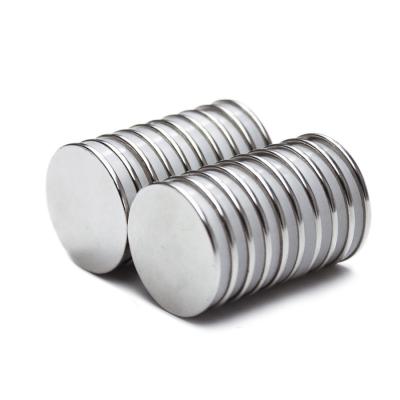 China Tolerance ±1mm Permanent N35-N52 Neodymium Disc Adhesive Magnet with 3M Self Adhesive for sale