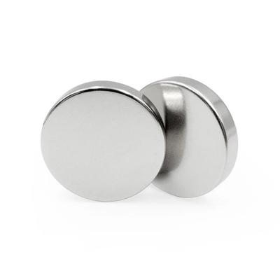 China 80-220 Degree Centigrade Rare Earth Disc Magnet with Thickness Magnetism Direction for sale