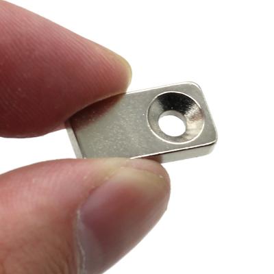 China Custom Magnetized Direction N35 Strong Neodymium Rare Earth Block Countersunk Magnet for sale