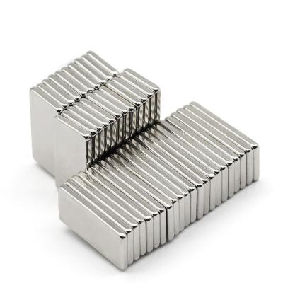 China Nickel Coated N52 High Br Neodymium Magnet Rectangular Shape Super Power NdFeB Block Magnets for sale