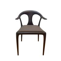 China Sculptural Ash Wood Dining Chair with Dynamic Lines and Tufted Leather Seat for Restaurants and Homes for sale