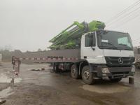 China Zoomlion 63m ACTROS 4141 Used Truck Mounted Concrete Pump for sale