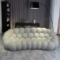 China Custom Modern Reclining Upholstered Corner Sofa Set Frameless Boneless Compressed Sofa Living Room for sale