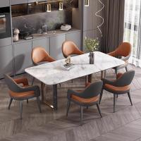 China Italian Luxury Leather Dining Chair with Metal Frame Armrests for Hotel Home Use for sale
