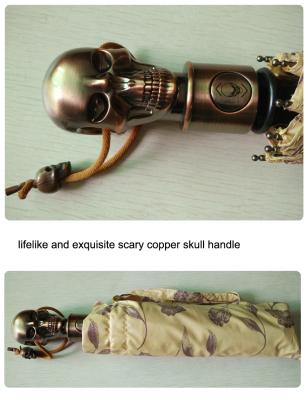 China 23 Inch 3-Fold Auto Open Close Umbrella with Copper Skull Handle for sale