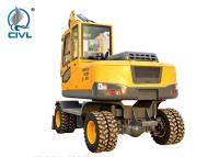 China 6000kg Wheeled Excavator / Mini Tire Excavators / Wood Grabber New Compact Excavators 55kw Engine Excavator Color Option for sale