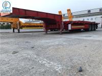China Hydraulic Flatbed International Semi Truck Trailer 80 Tons 17m Strong Loading Construction Machines for sale