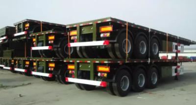 China 20 Feet And 40 Feet Flat Deck Semi Trailer Trucks With 12 Tires Cimc Sinotruk for sale