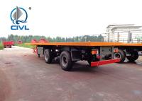China 3 Axles New Loading Construction Machines Hydraulic Flatbed Semi Trailer 70 Tons 17m for sale